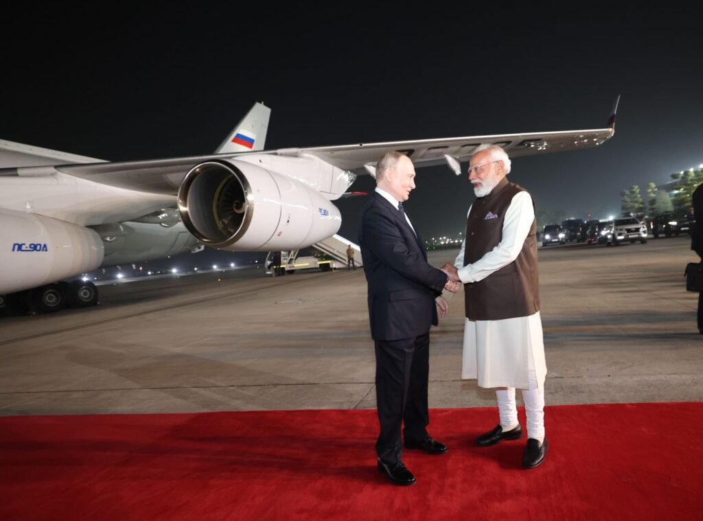 A Hug, a Handshake, and a Surprise: PM Modi Receives Putin at Airport ...